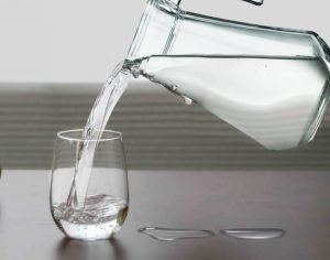 Water Pouring: Why Does Water Stick To Glass When Pouring?