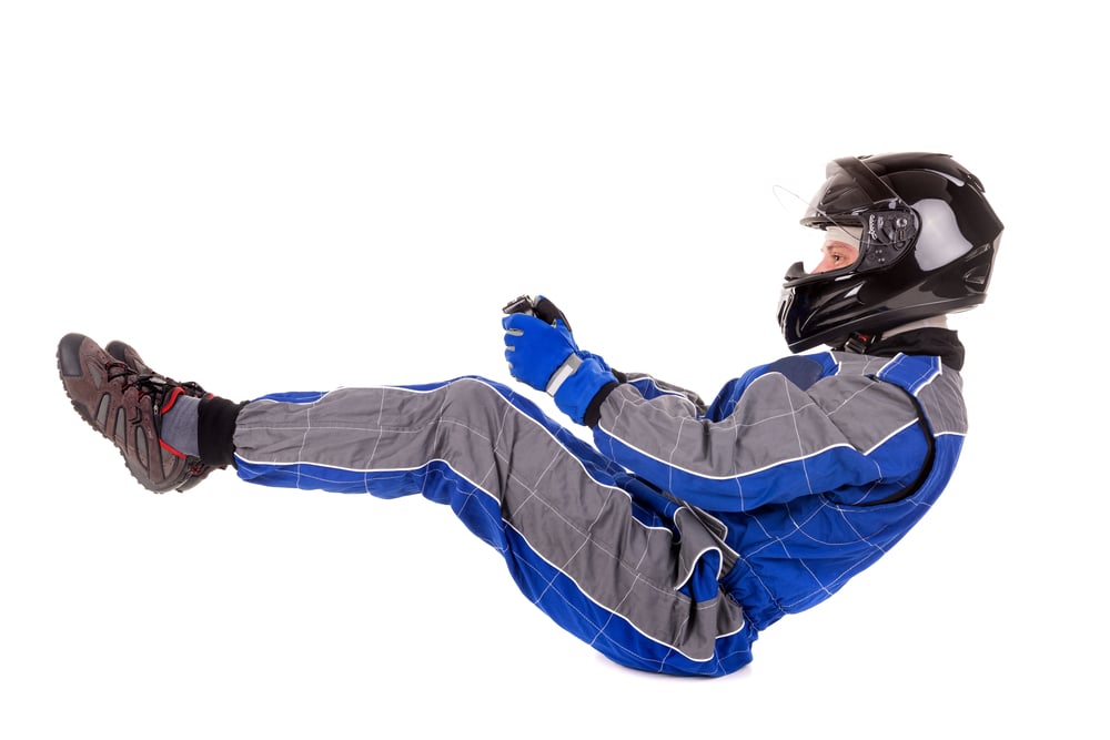 Why Do Formula One Racers Lie Down While Driving?